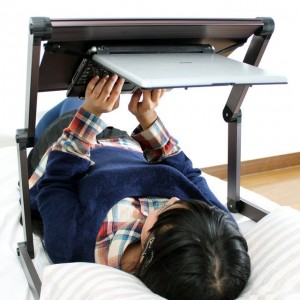 Enjoy working in bed? Then you need this upside down laptop stand ...
